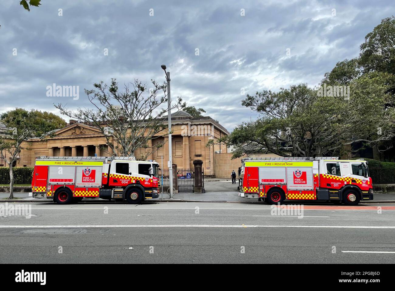 Fire trucks respond to an emergency evacuation alarm at the ...