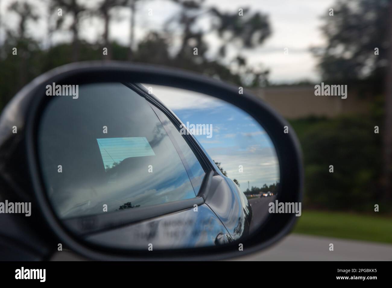 Rear view mirror driving hi-res stock photography and images - Alamy