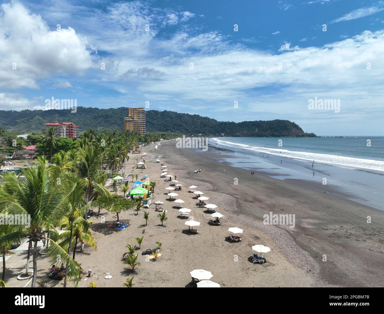 From above, Jaco Beach in Costa Rica is a stunning sight: white sands, blue waters, and lush ...
