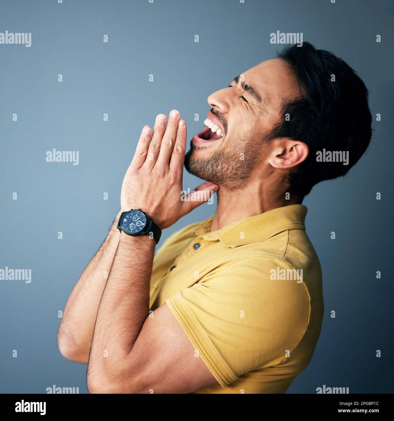 Praying, shouting and begging with a man in studio on a gray background ...