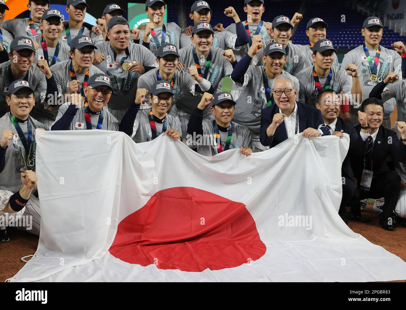 Japan's players pose for a photo after winning the World Baseball ...
