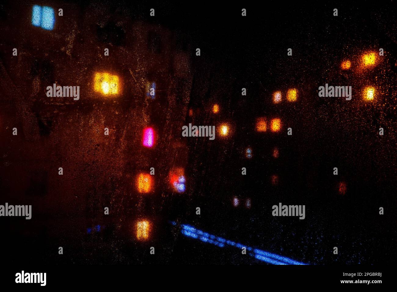 Water drops reflections on the window in night Stock Photo - Alamy