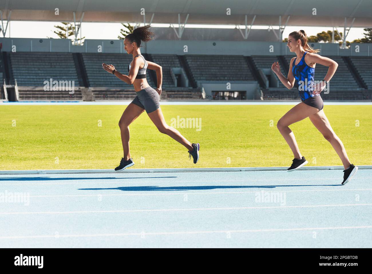 shes setting the pace. Full length shot of two attractive young female ...