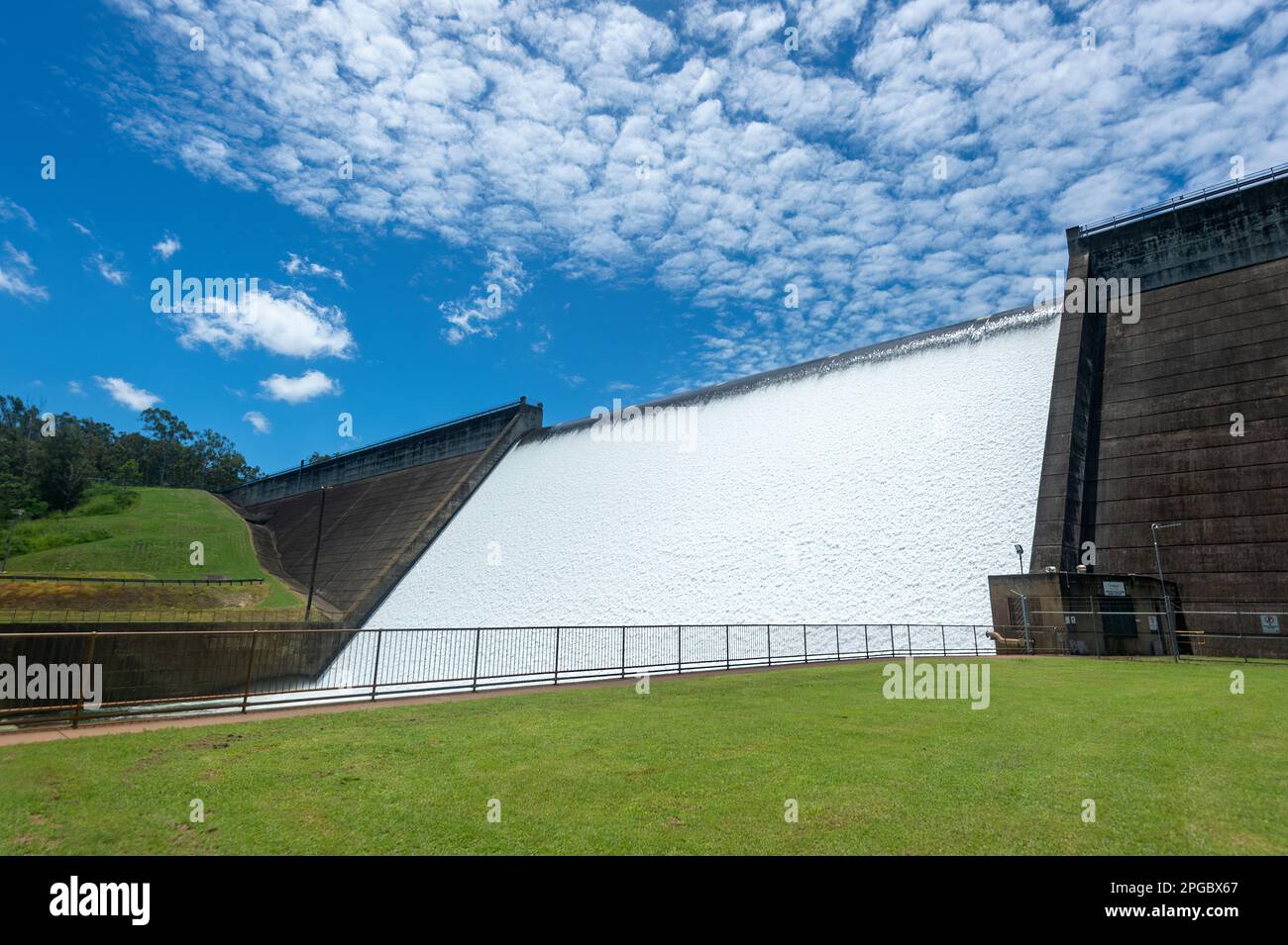 Lake Tinaroo Dam flowing over the spillway in a rare occurrence ...