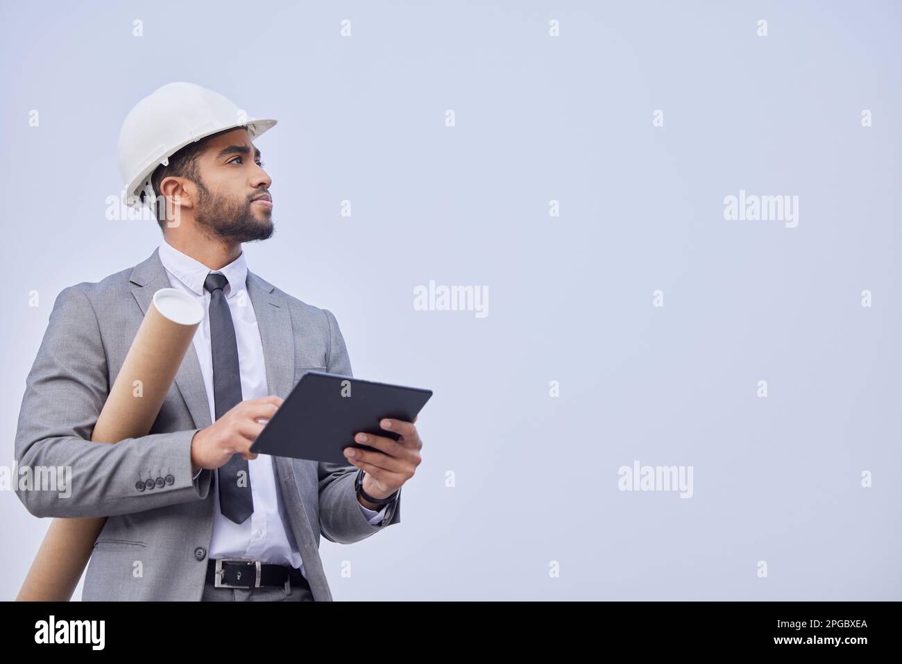 Engineer, tablet and man thinking at construction site for development ...