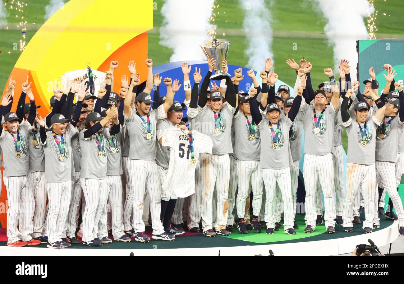 Japan's players pose for a photo after winning the World Baseball ...