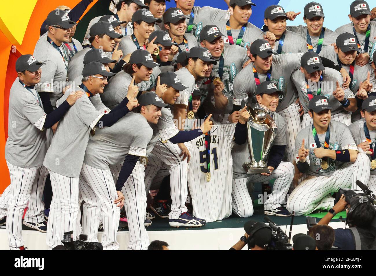 Japan's players pose for a photo after winning the World Baseball Classic (WBC) final match ...