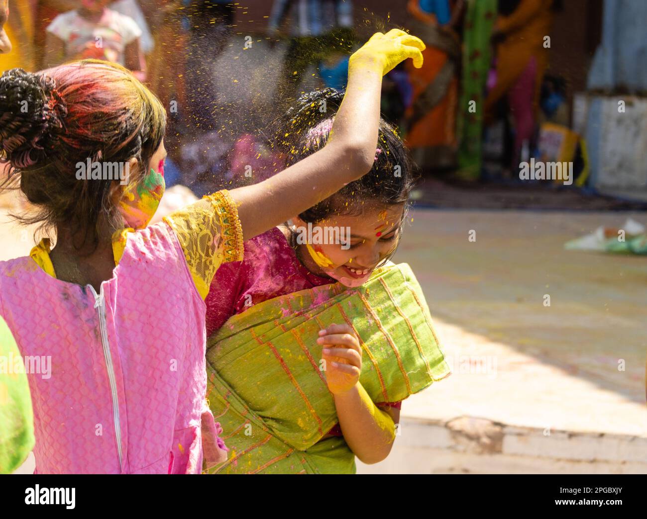 Indian Bengali children in traditional dress playing holi - the ...