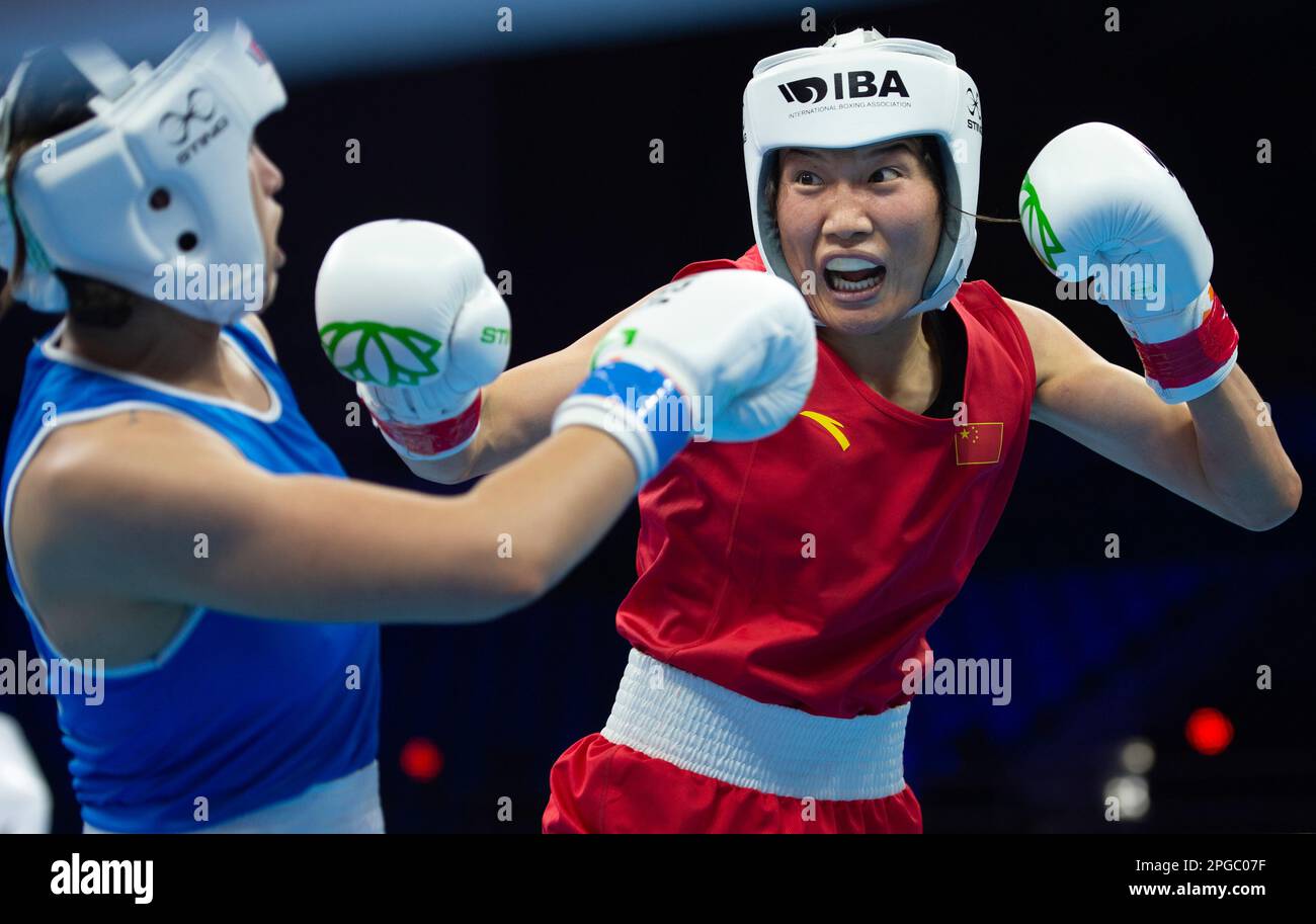 New Delhi, India. 21st Mar, 2023. Yang Liu (R) of China competes with ...