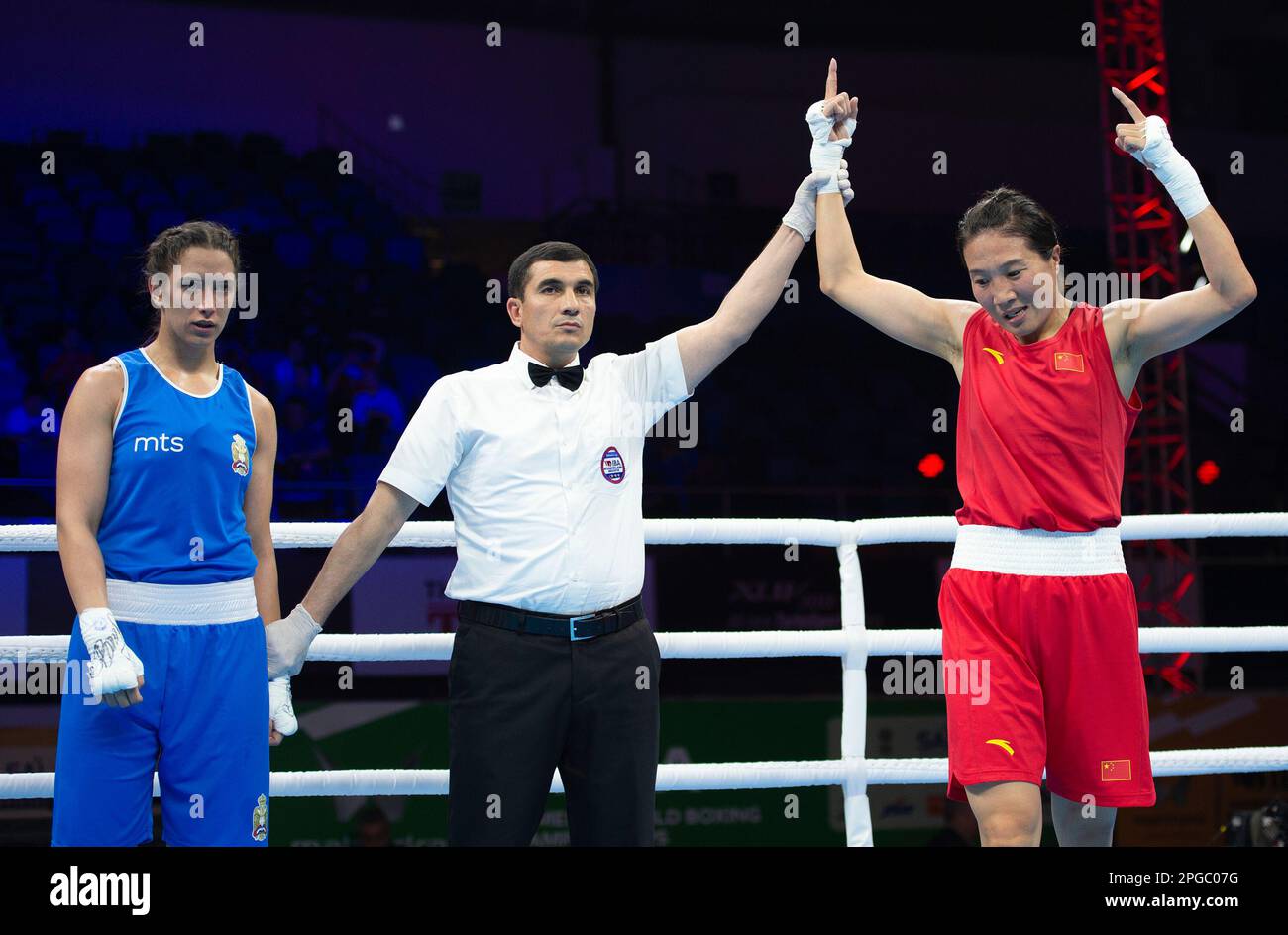 New Delhi, India. 21st Mar, 2023. Yang Liu (R) of China is declared the ...