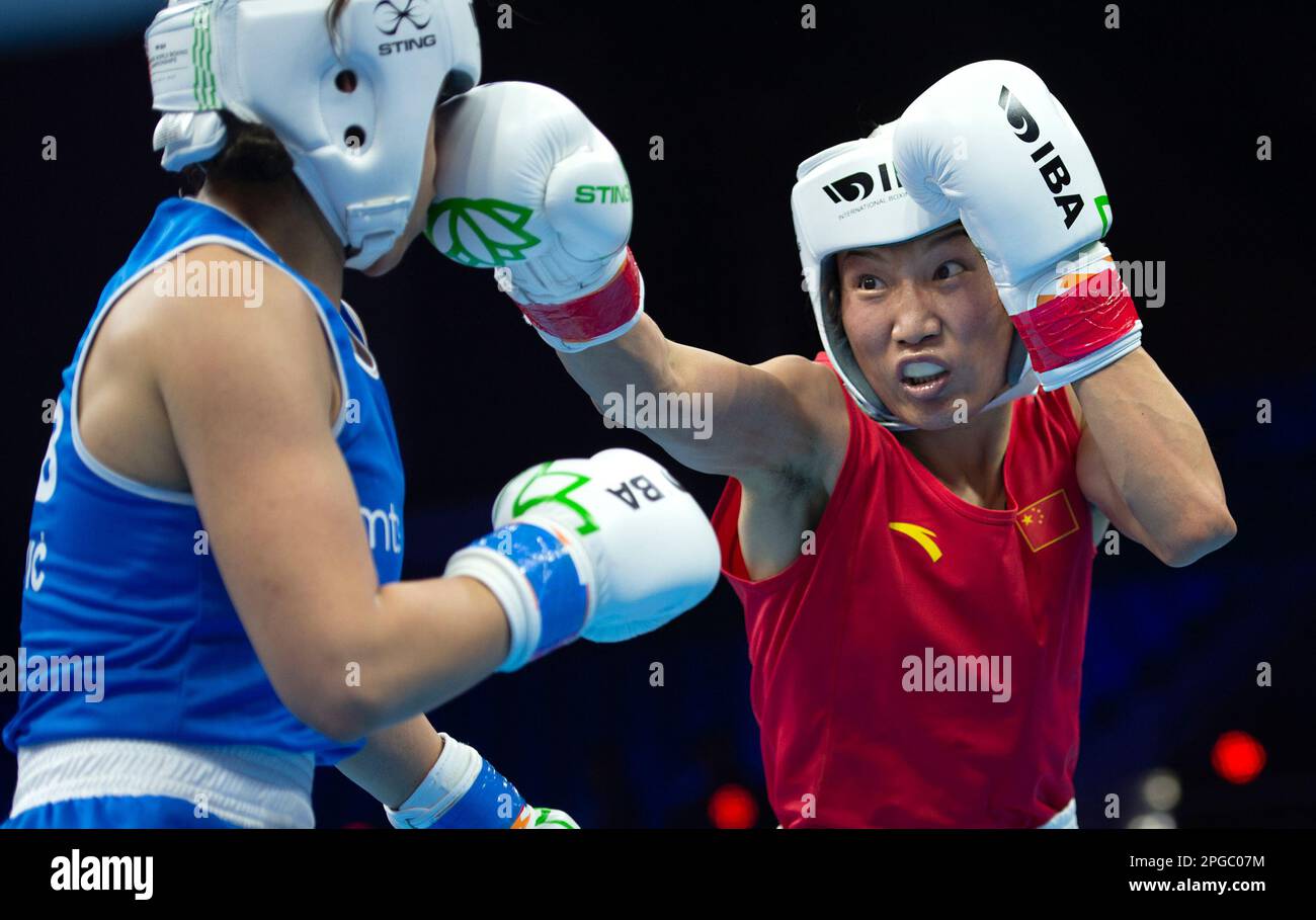 New Delhi, India. 21st Mar, 2023. Yang Liu (R) of China competes with ...