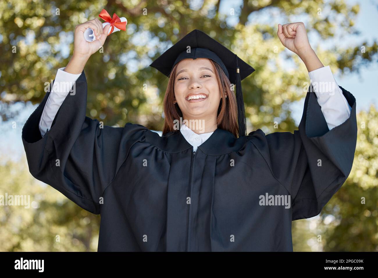 Success, graduation and portrait of a woman with a diploma for ...