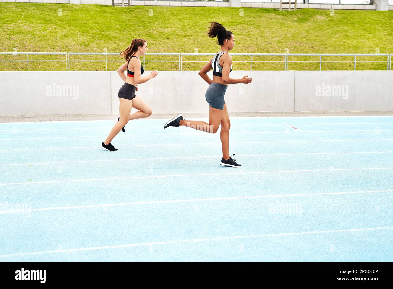 We push each other to our limits. Full length shot of two attractive ...