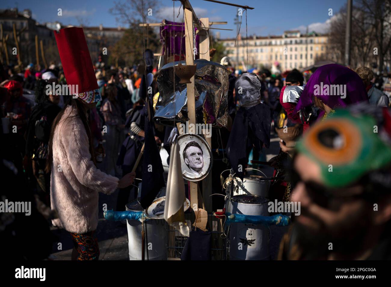 Carnival goers practice voodoo with incense on pictures of French ...