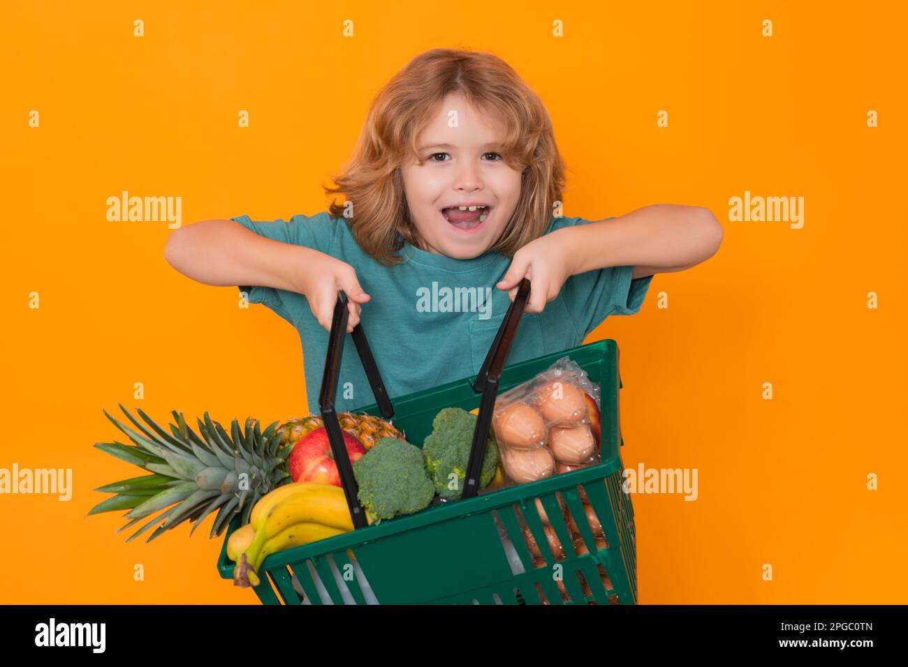 Grocery shop. Funny child shopping with shopping basket. Sales and ...