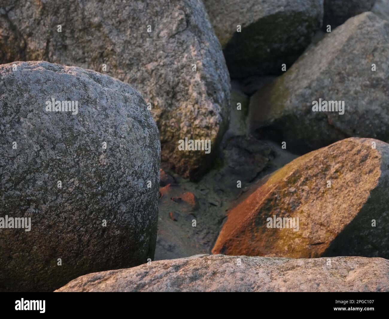 A large collection of rocks in a variety of shapes and sizes scattered ...