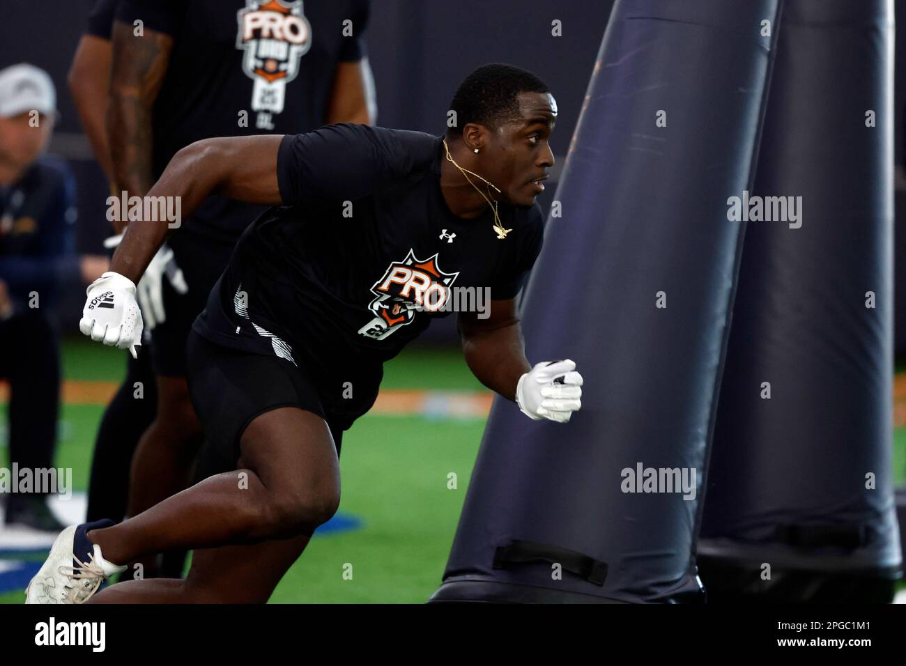 Auburn linebacker Derick Hall performs a drill as NFL scouts watch ...