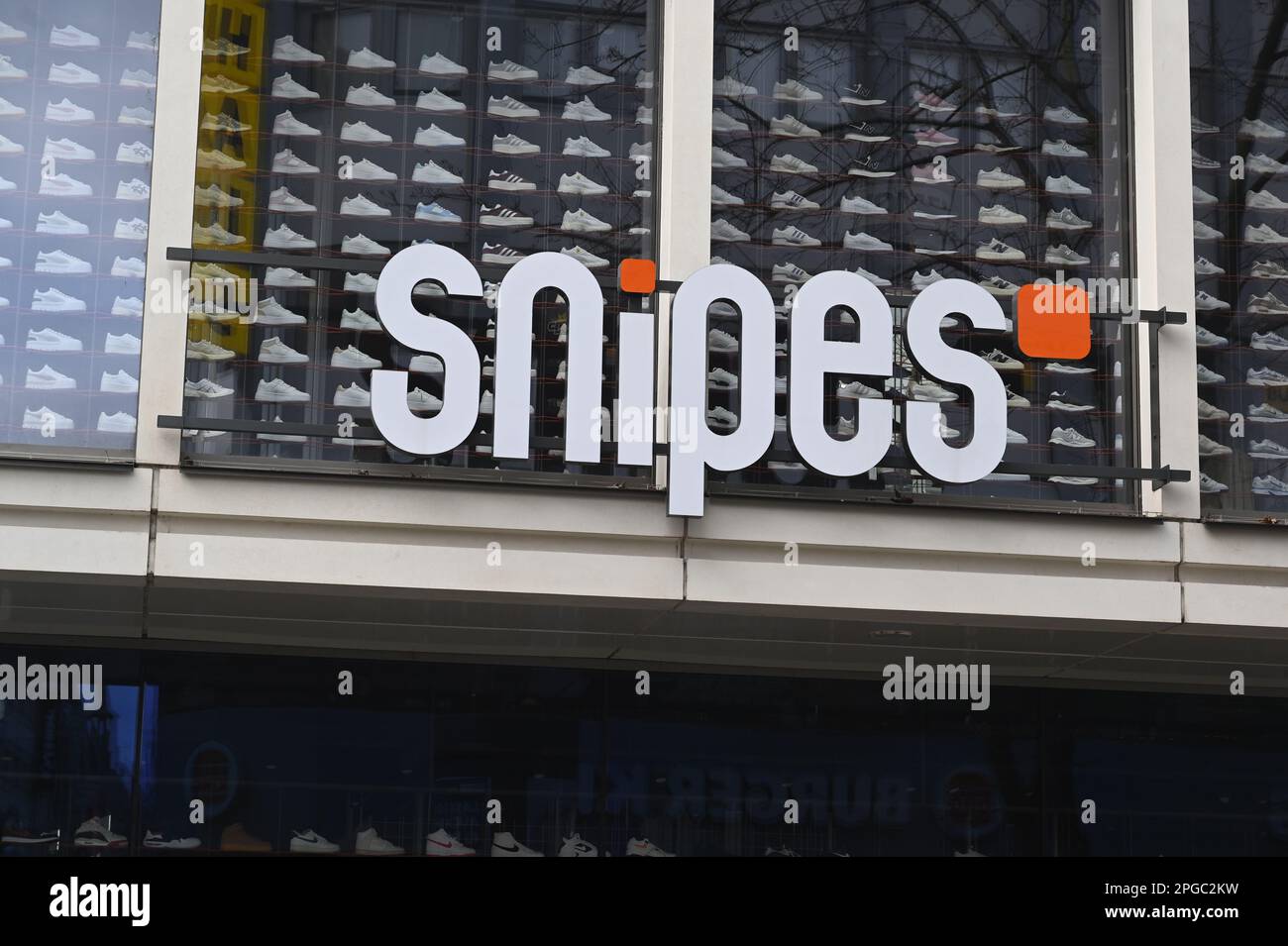 Cologne, Germany. 19th Mar, 2023. Logo, lettering on a branch of Snipes ...