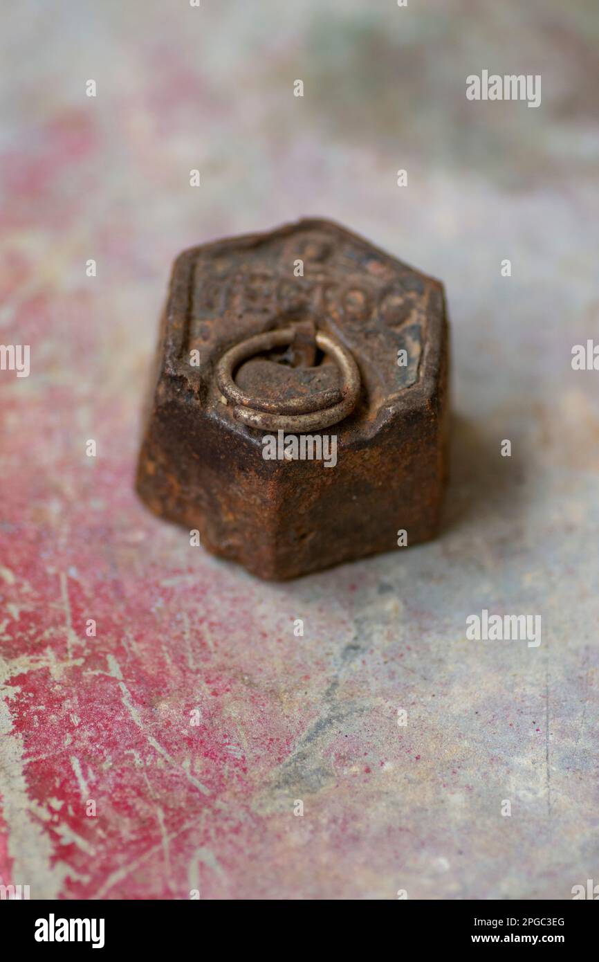 Old rusty scale weight Stock Photo - Alamy