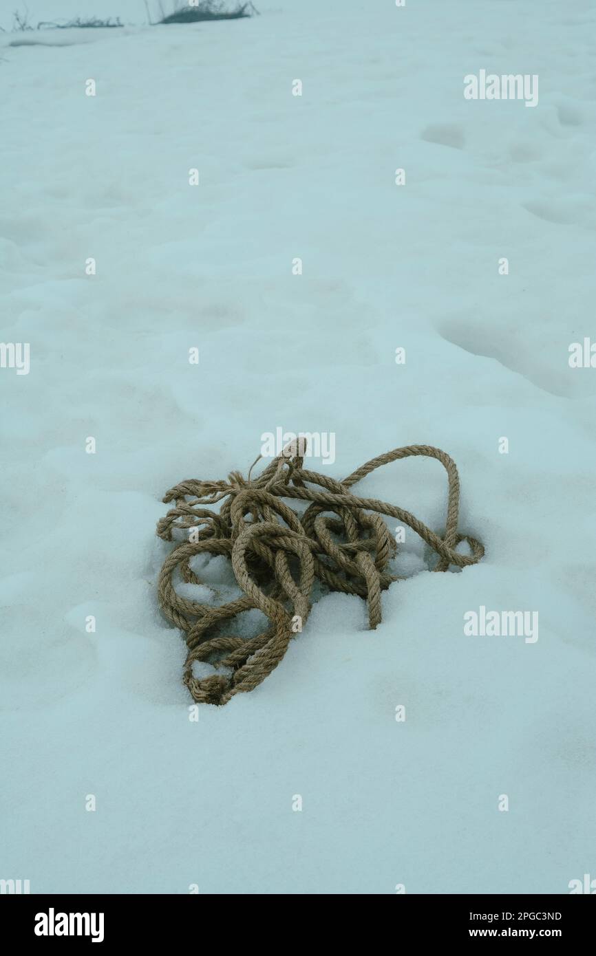 Rope in snow hi-res stock photography and images - Alamy