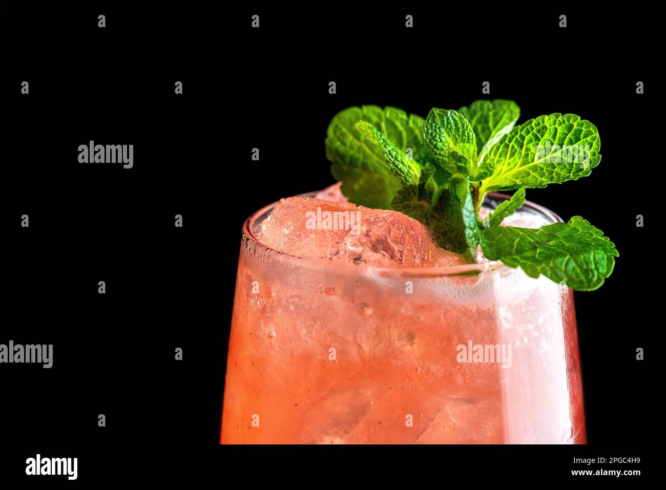 Highball glass of cocktail with red grapefruit and gin with vodka with ...