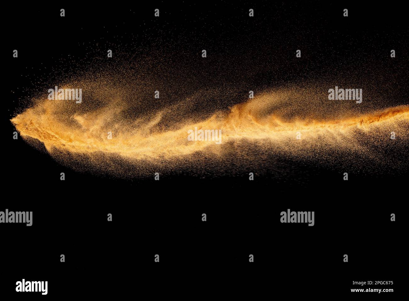 Brown colored sand splash.Dry river sand explosion isolated on black ...