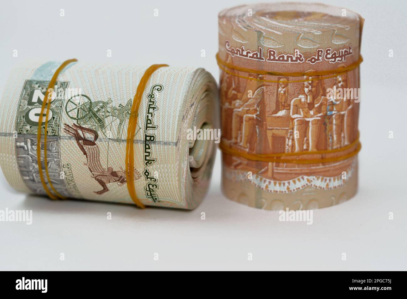 Rolls of 1 EGP LE one Egyptian pound cash money bills and 5 LE five ...
