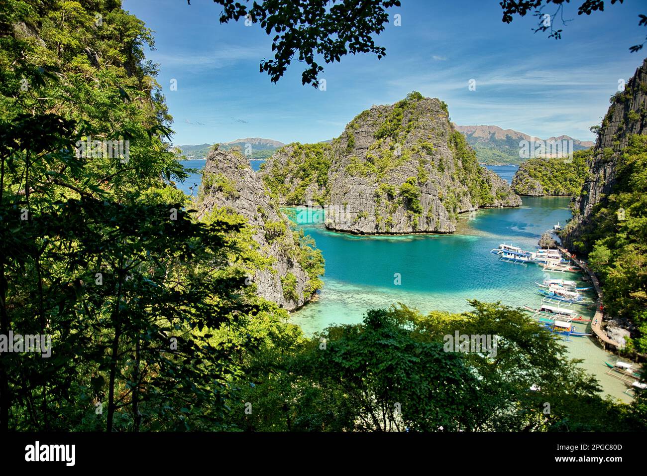A bay with majestic rocks in Coron, Palawan in the Philippines that are ...