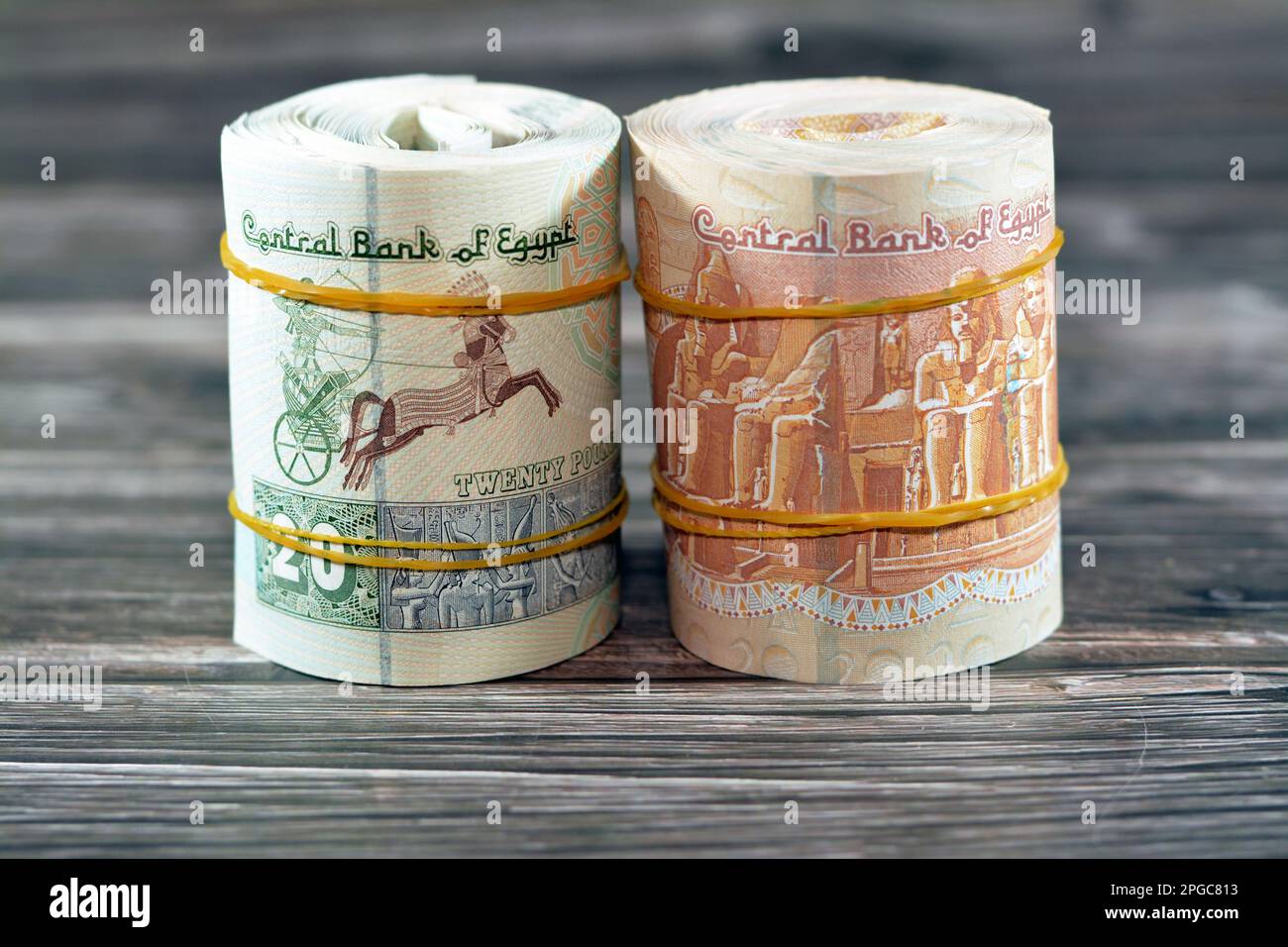 Rolls of 1 EGP LE one Egyptian pound cash money bills and 5 LE five ...
