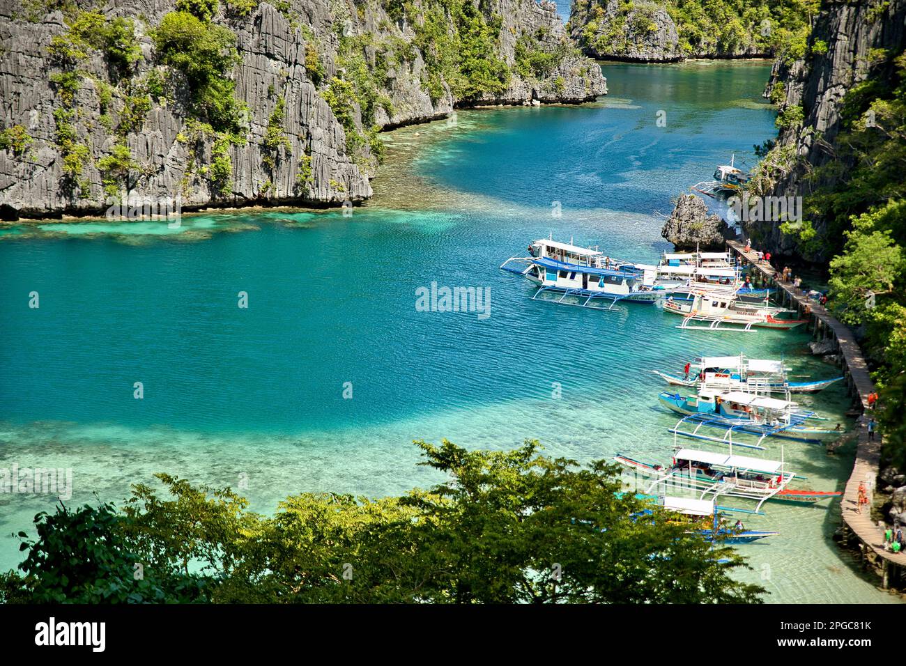 A bay with majestic rocks in Coron, Palawan in the Philippines that are ...