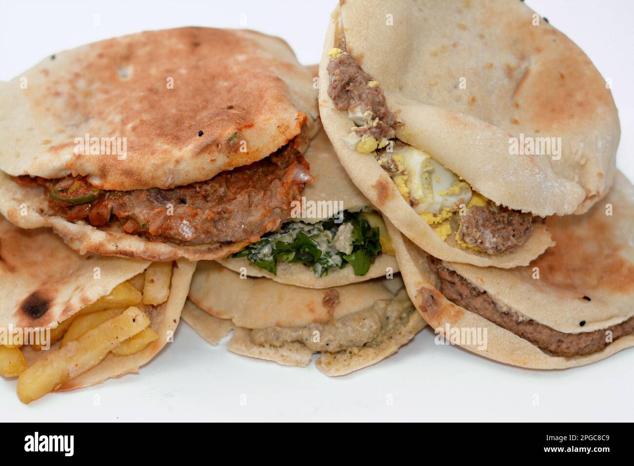 Traditional Egyptian breakfast street sandwiches of mashed fava beans ...