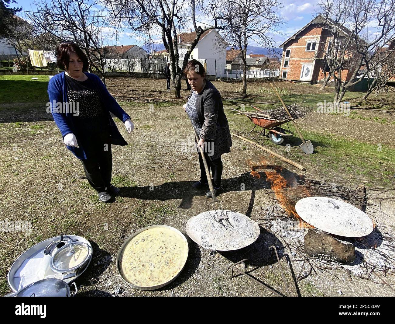 People bake flia in Prizen, Kosovo on March 12, 2023. It is an Albanian ...