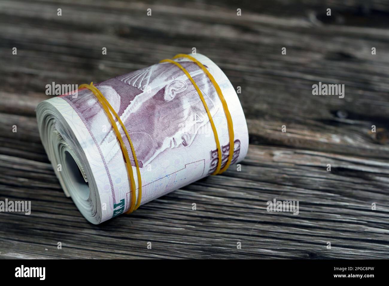 Rolled up ten pound note hi-res stock photography and images - Alamy