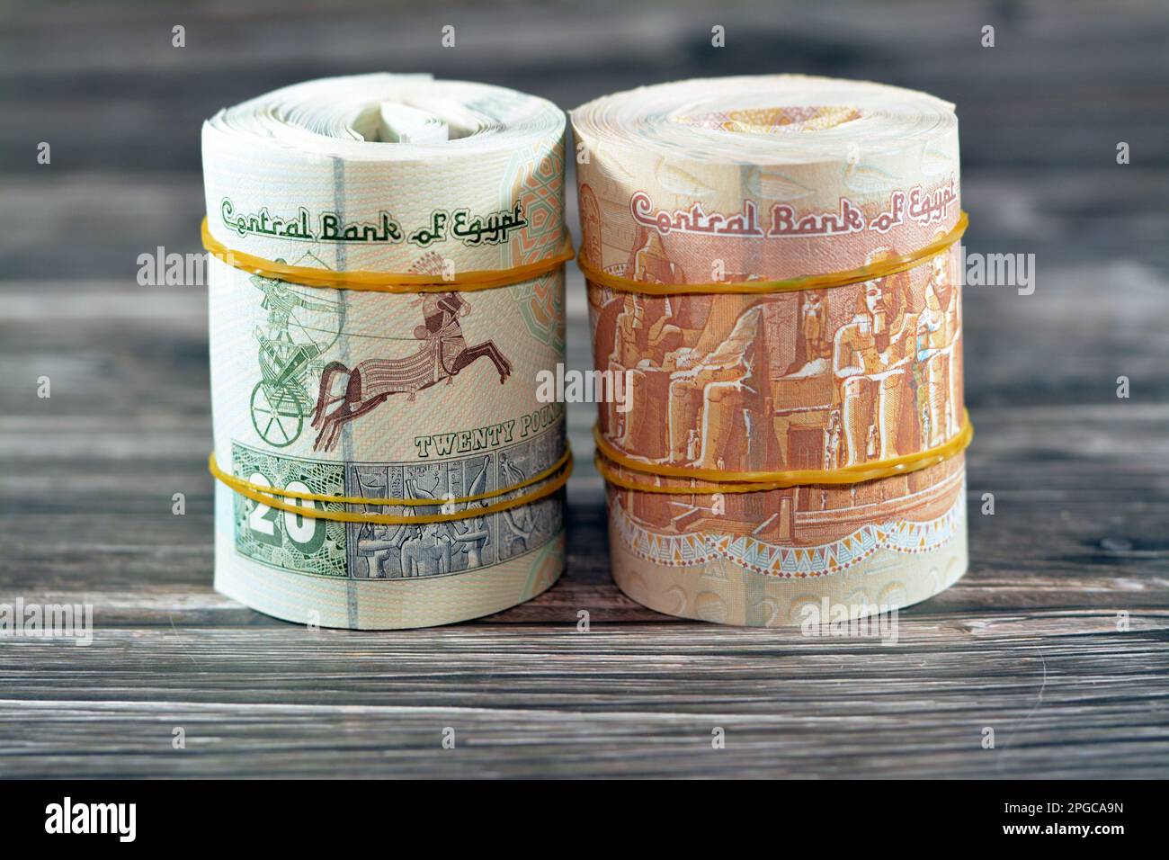 Rolls of 1 EGP LE one Egyptian pound cash money bills and 5 LE five ...