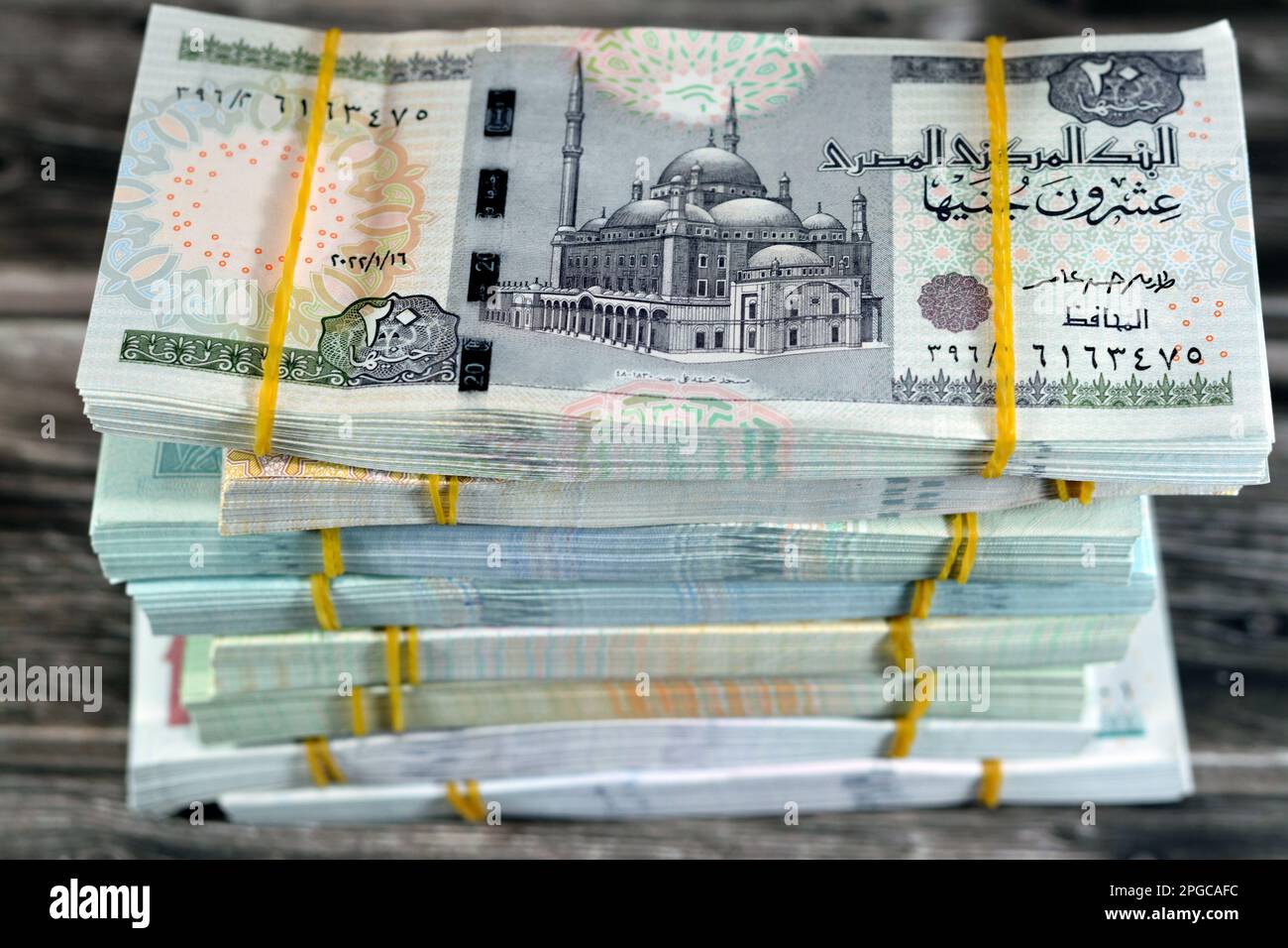 Pile and stacks of Egyptian money currency cash banknotes put together ...