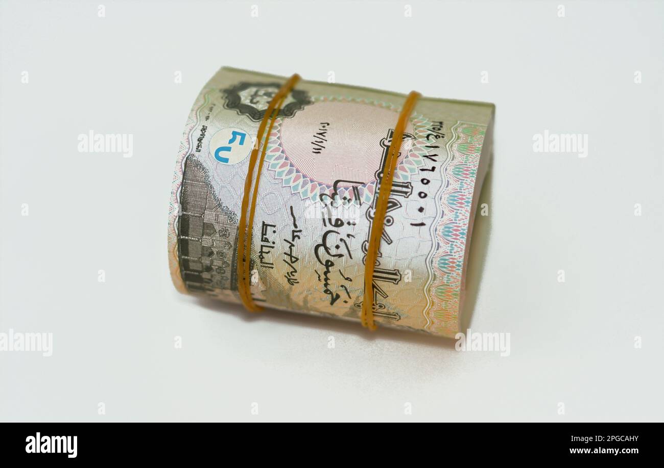 50 pound note rolled up hi-res stock photography and images - Alamy