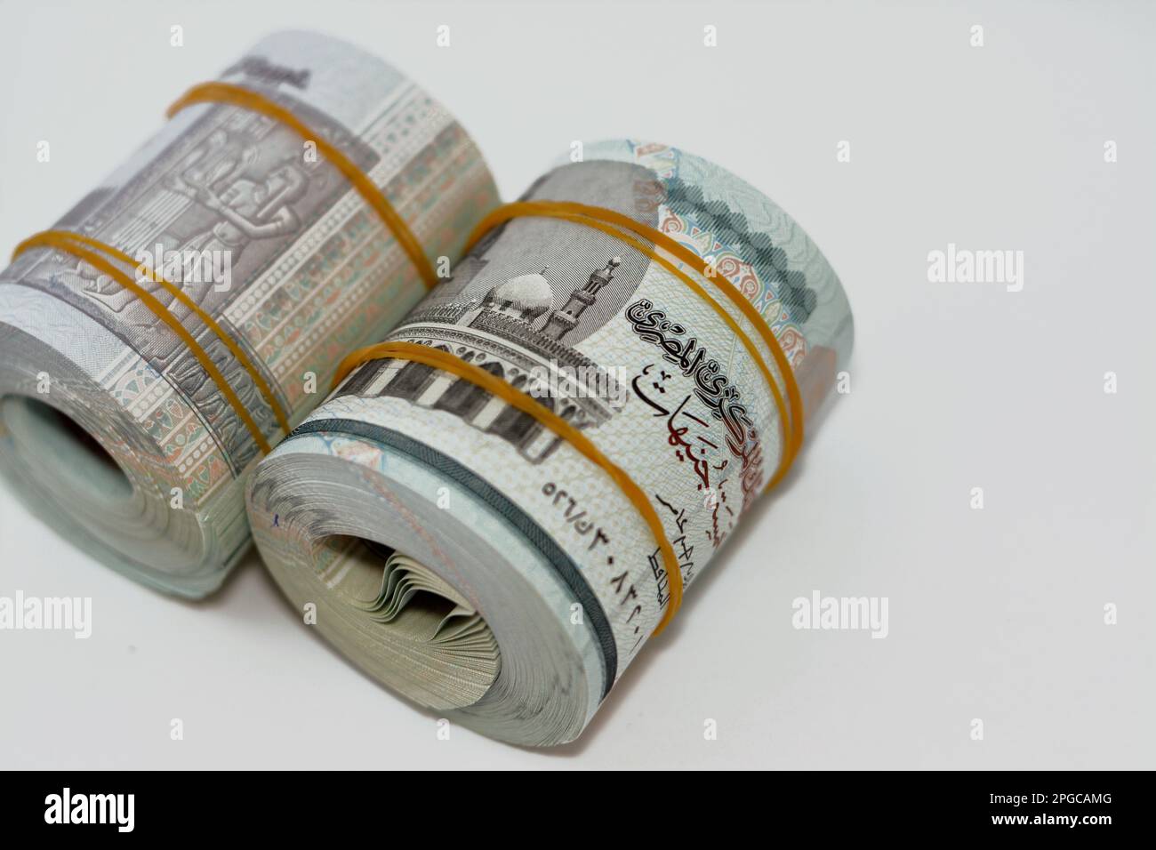 5 EGP LE five Egyptian pounds cash money bills rolled up with rubber ...