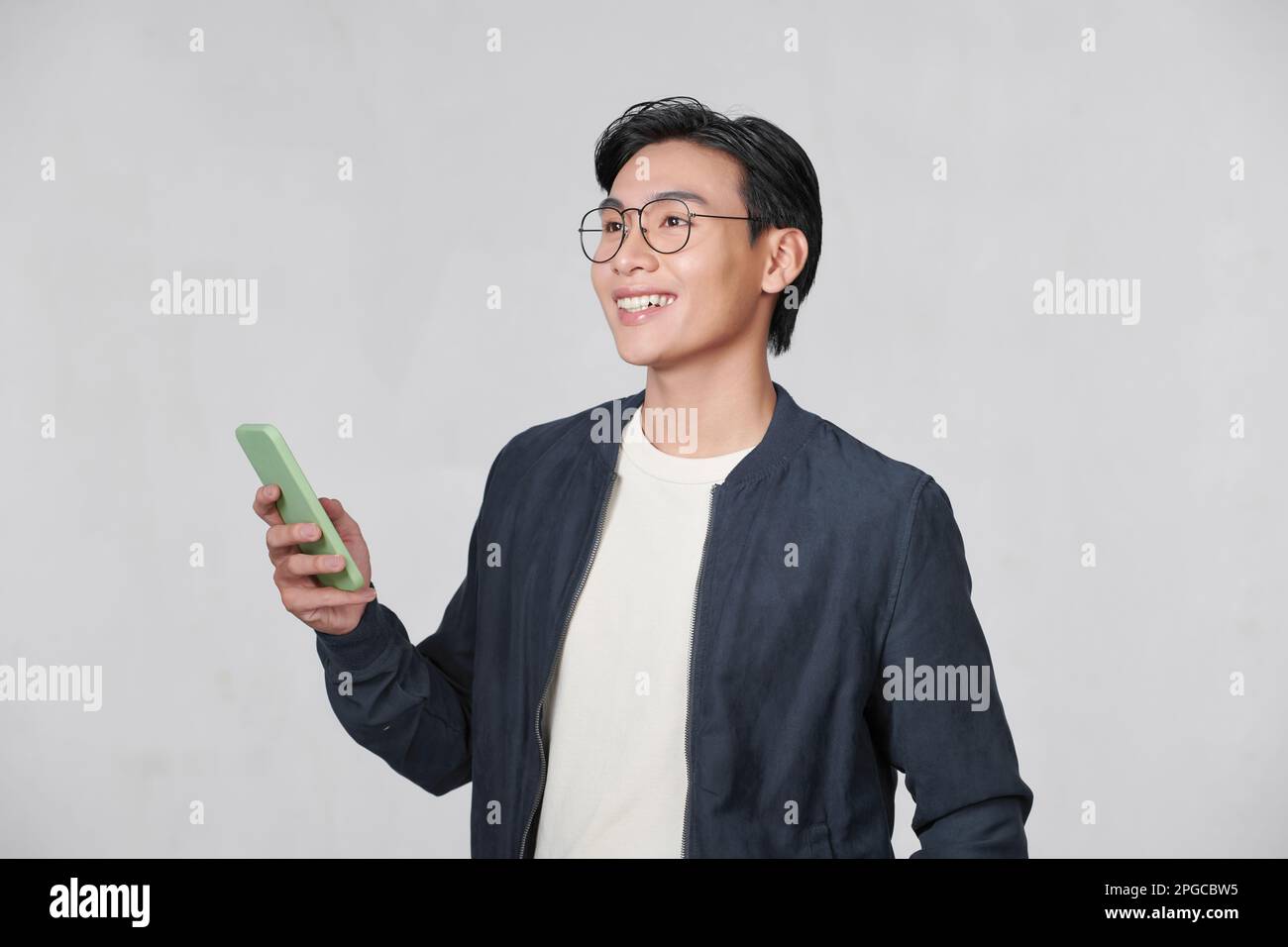 Man Standing Using Phone Isolated Stock Photo - Alamy