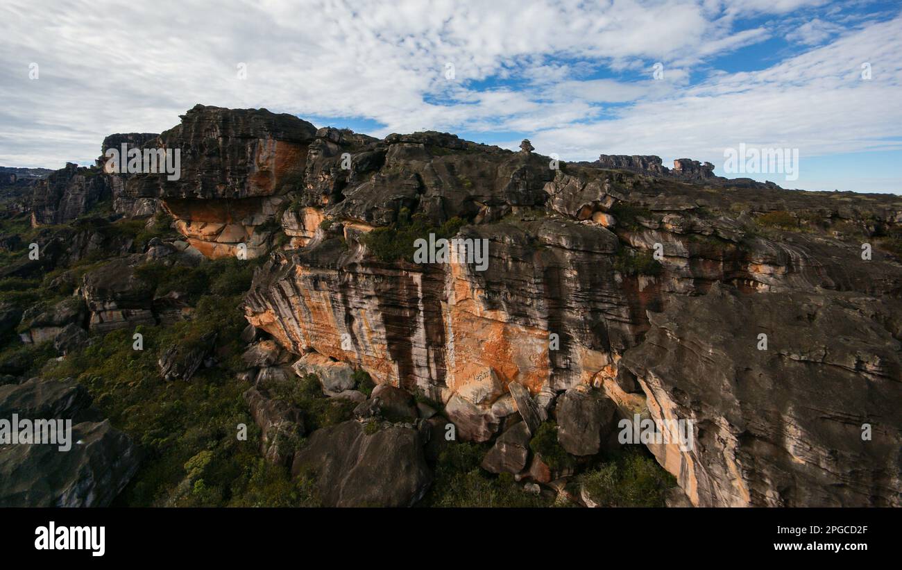 Steep sandstone cliffs on the plateau of Auyan tepui, a famous table ...