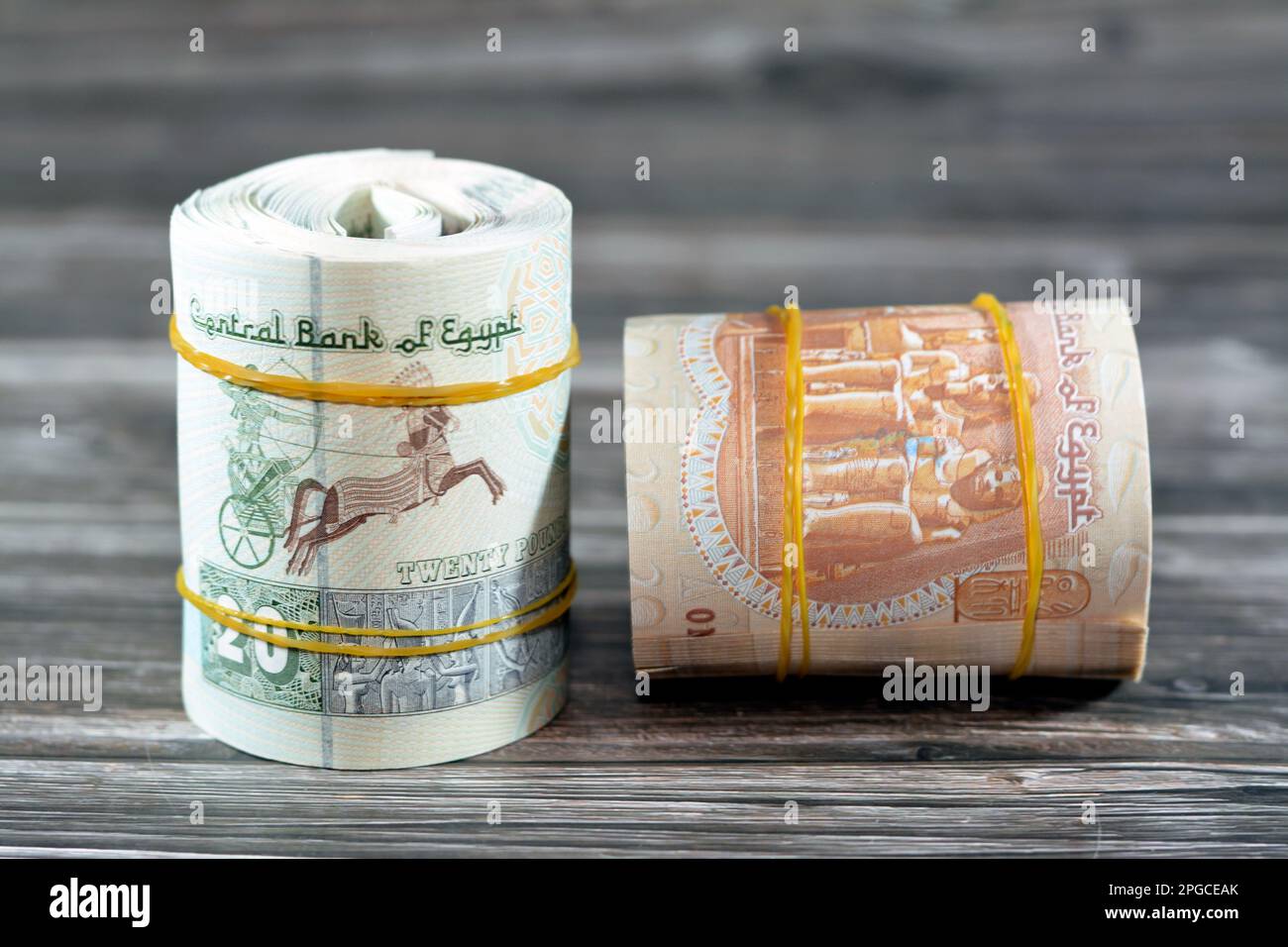 Rolls of 1 EGP LE one Egyptian pound cash money bills and 5 LE five ...
