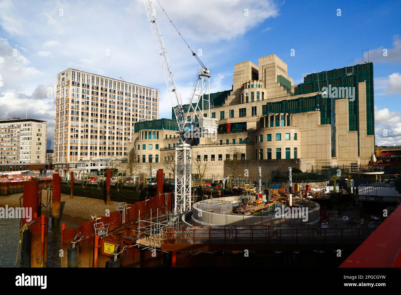 Construction site on bank of River Thames next to MI6 building and ...