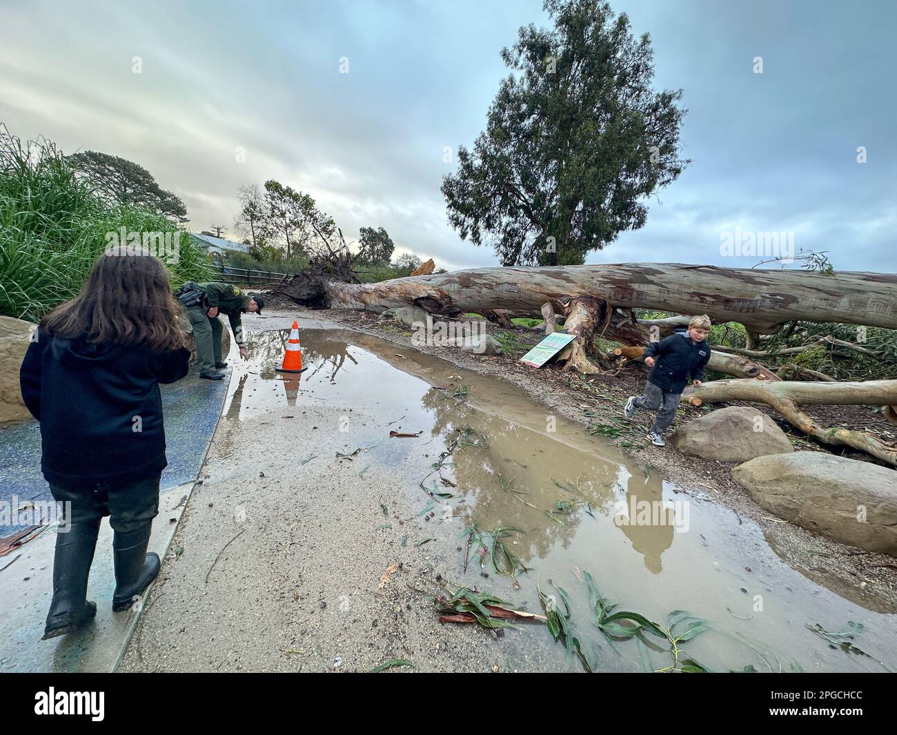 Carpinteria, California, USA. 21st Mar, 2023. Girl, Police man and boy ...
