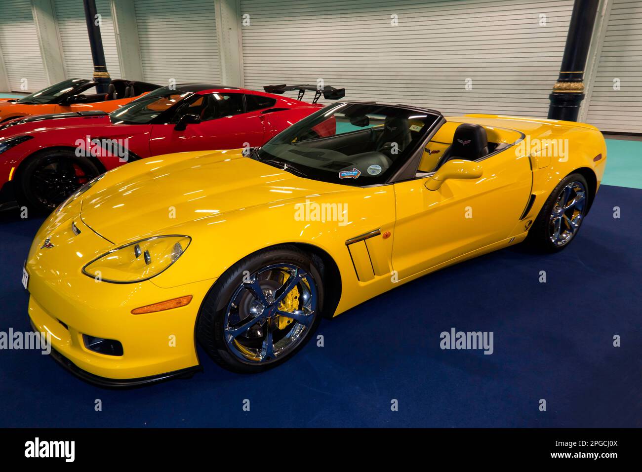 Side view of a Yellow, 2011, Chevrolet Corvette C6, on display at the ...
