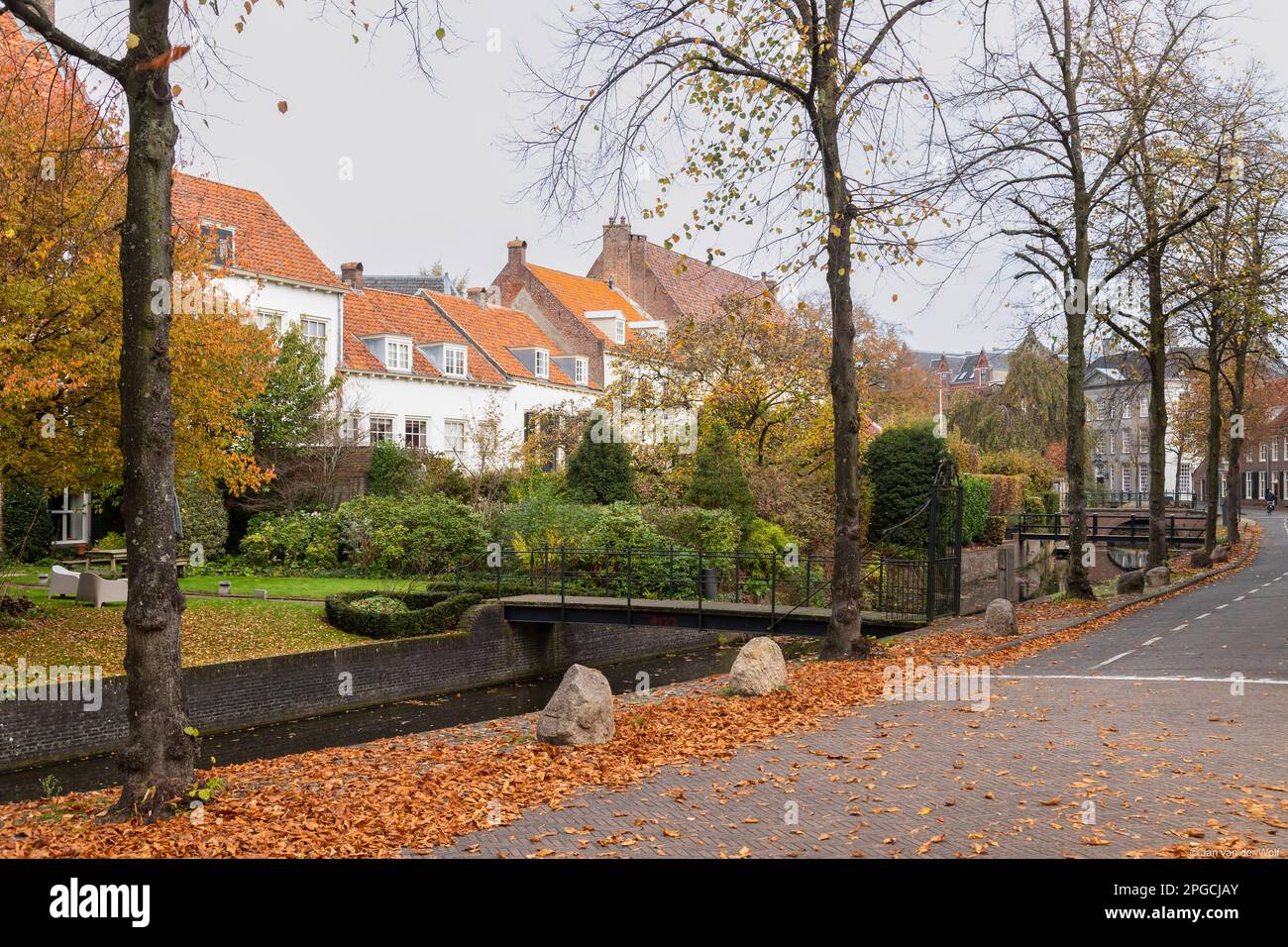 Stately monumental houses along the canal in the center of the medieval ...