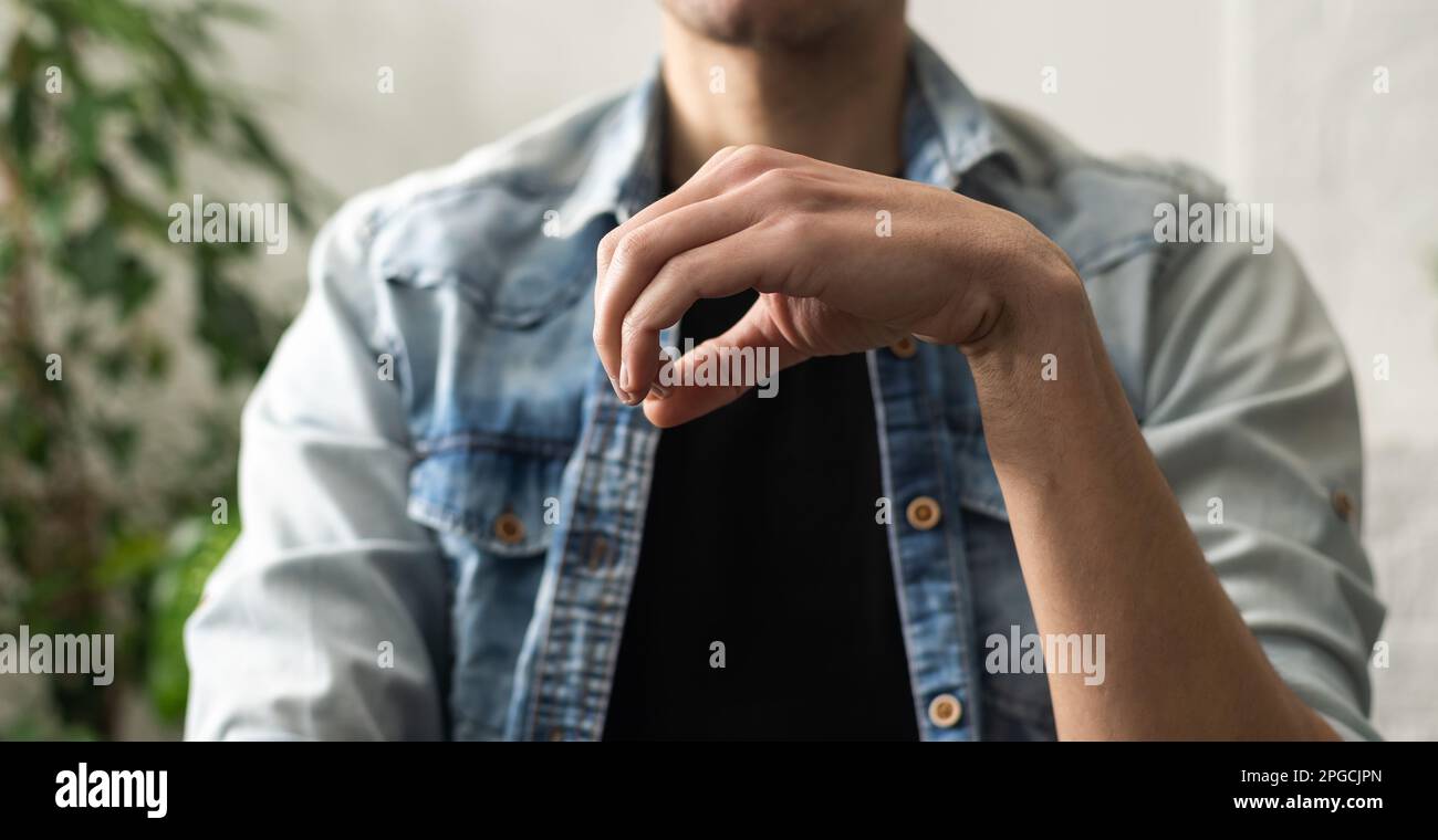 Sign language interpreter man translating a meeting to ASL, American ...