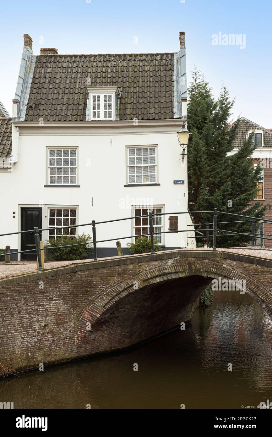 White house and bridge in the center of the Dutch historic city of ...