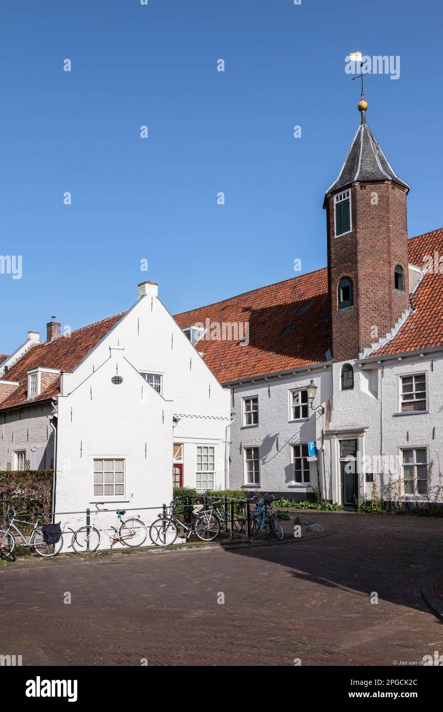 White painted 16th century house with octagonal stair tower in the ...