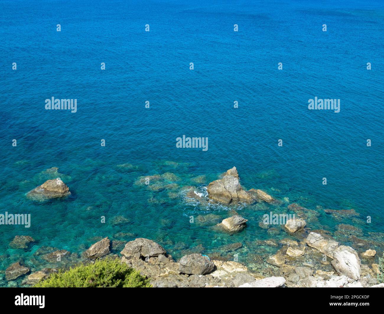 Aerial drone top view of beautiful sea waves and fantastic rocky coast ...