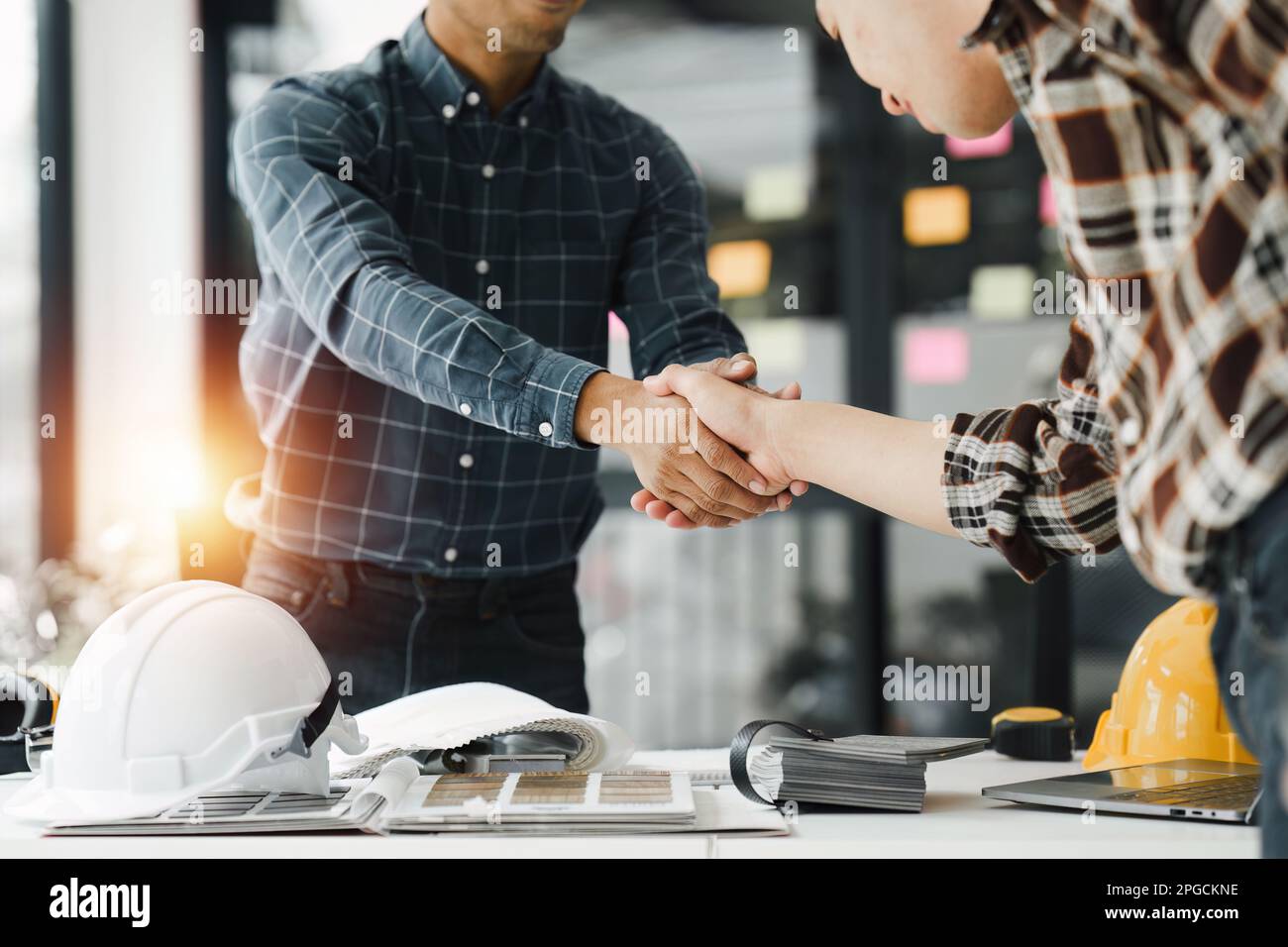Foreman or Civil engineer handshake making modern construction ...