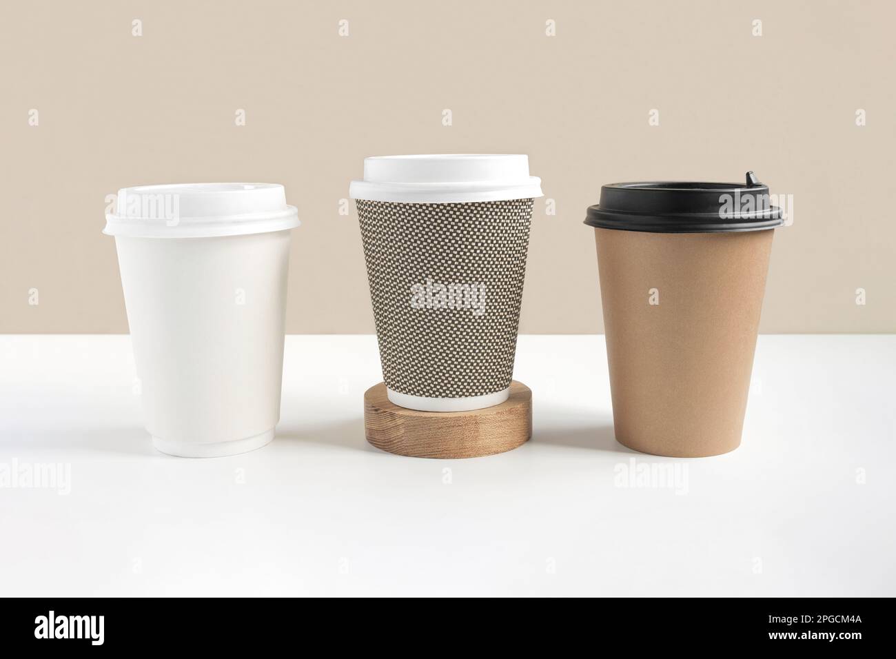 Front view of a tree coffee paper cup. Mockup with lid. Set of craft ...